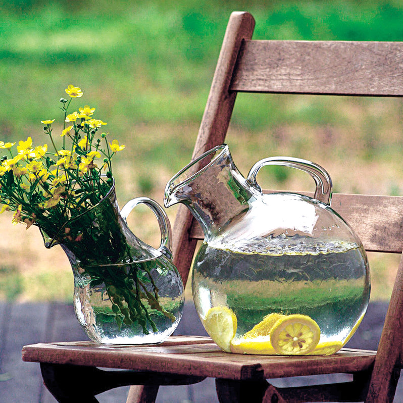 Modern Circular Tilted Glass Beverage Pitcher - Woodwaves